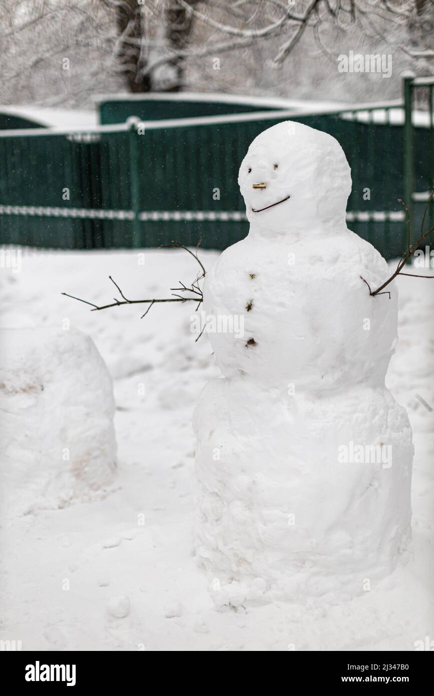 Snowman made snow stands hi-res stock photography and images - Alamy