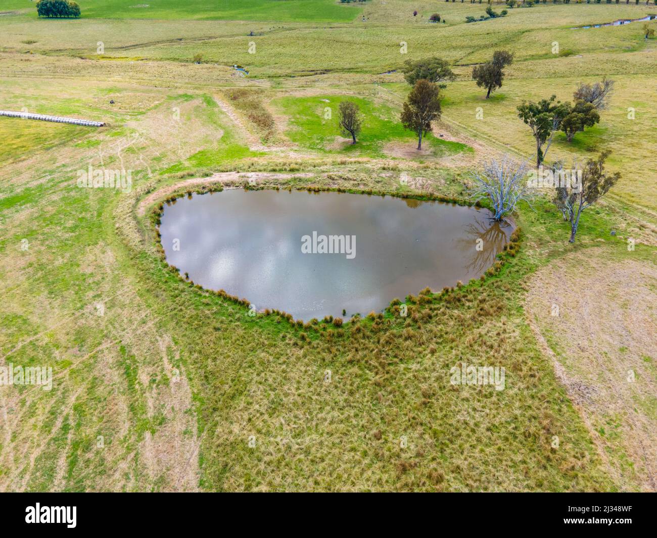 An aerial view of a water pond in a rural area at Wellington Vale ...
