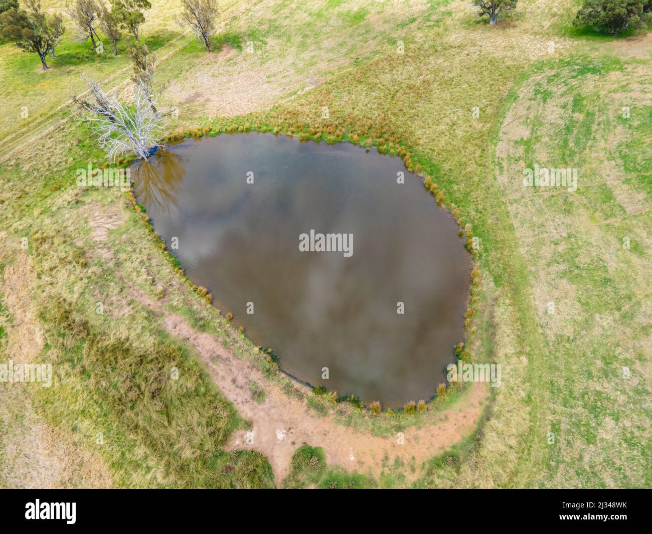 An aerial view of a water pond in a rural area at Wellington Vale ...