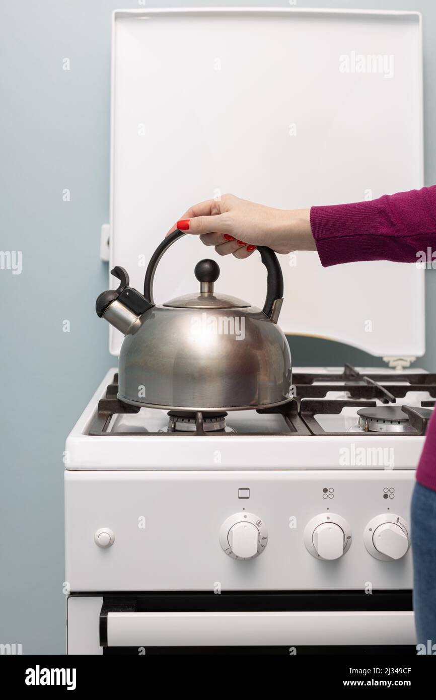 Old kettle on gas stove hi-res stock photography and images - Alamy