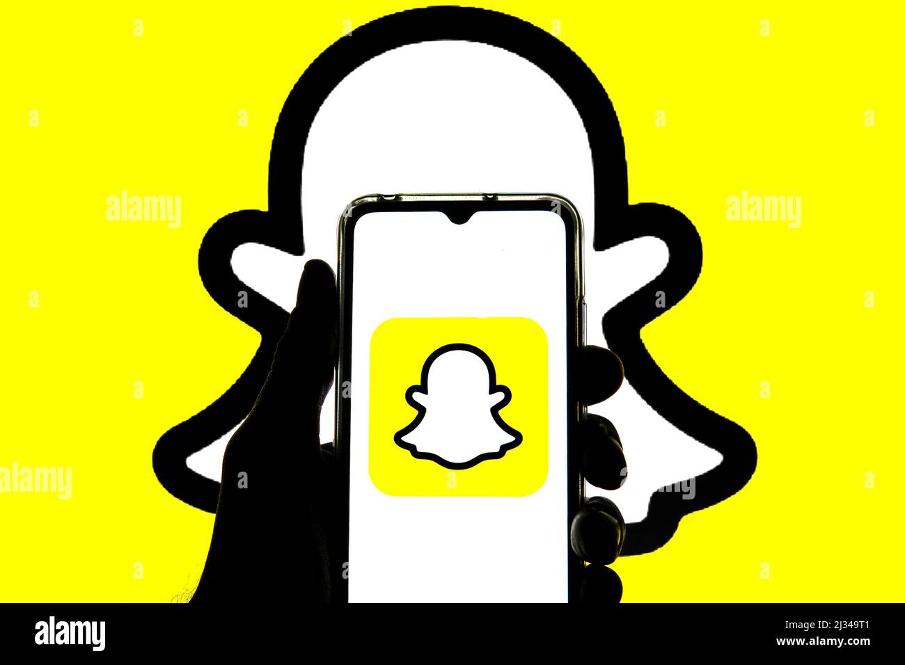 In this photo illustration a Snapchat logo seen displayed on a ...
