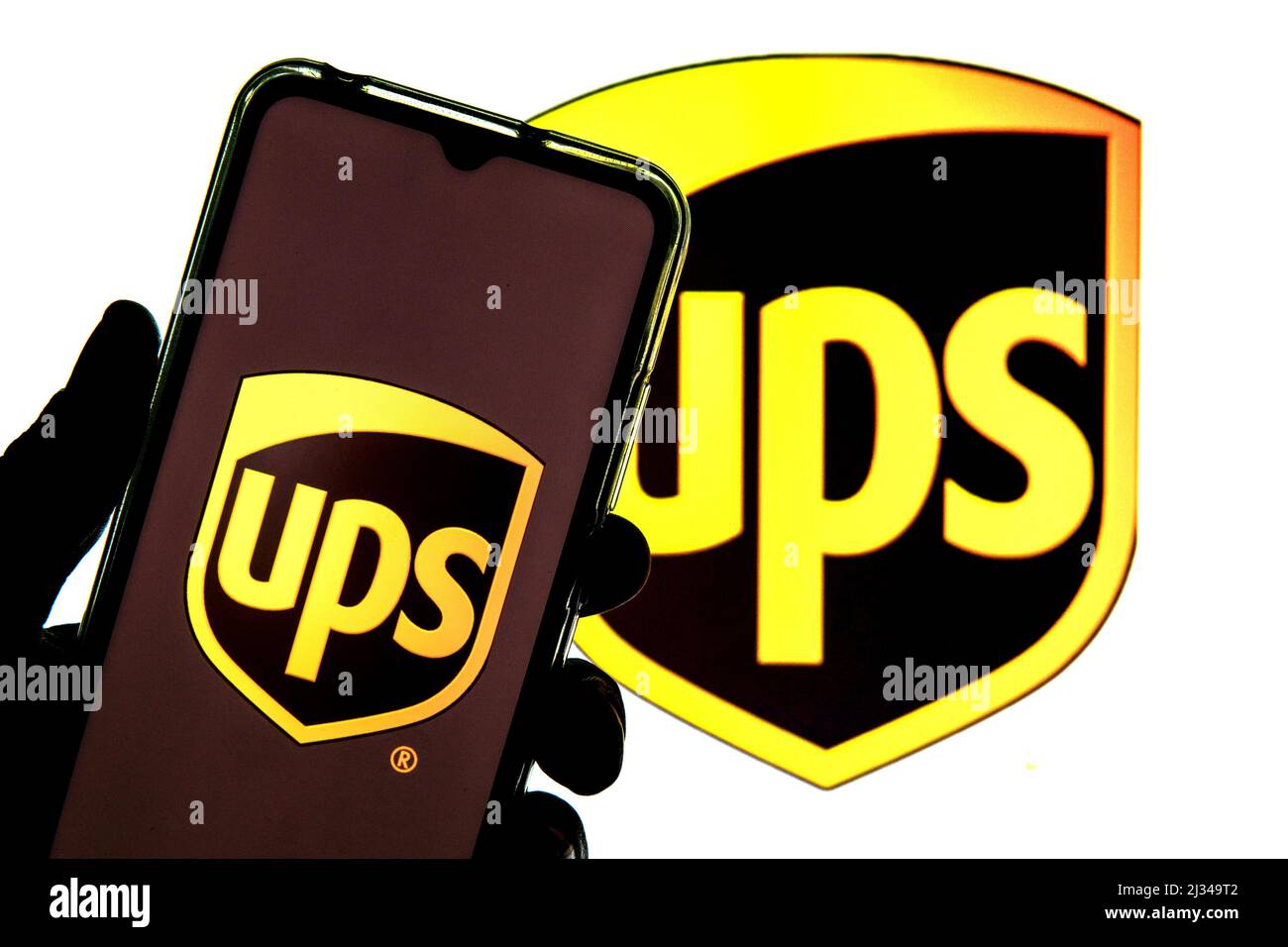 In this photo illustration a UPS (United Parcel Service) logo seen ...