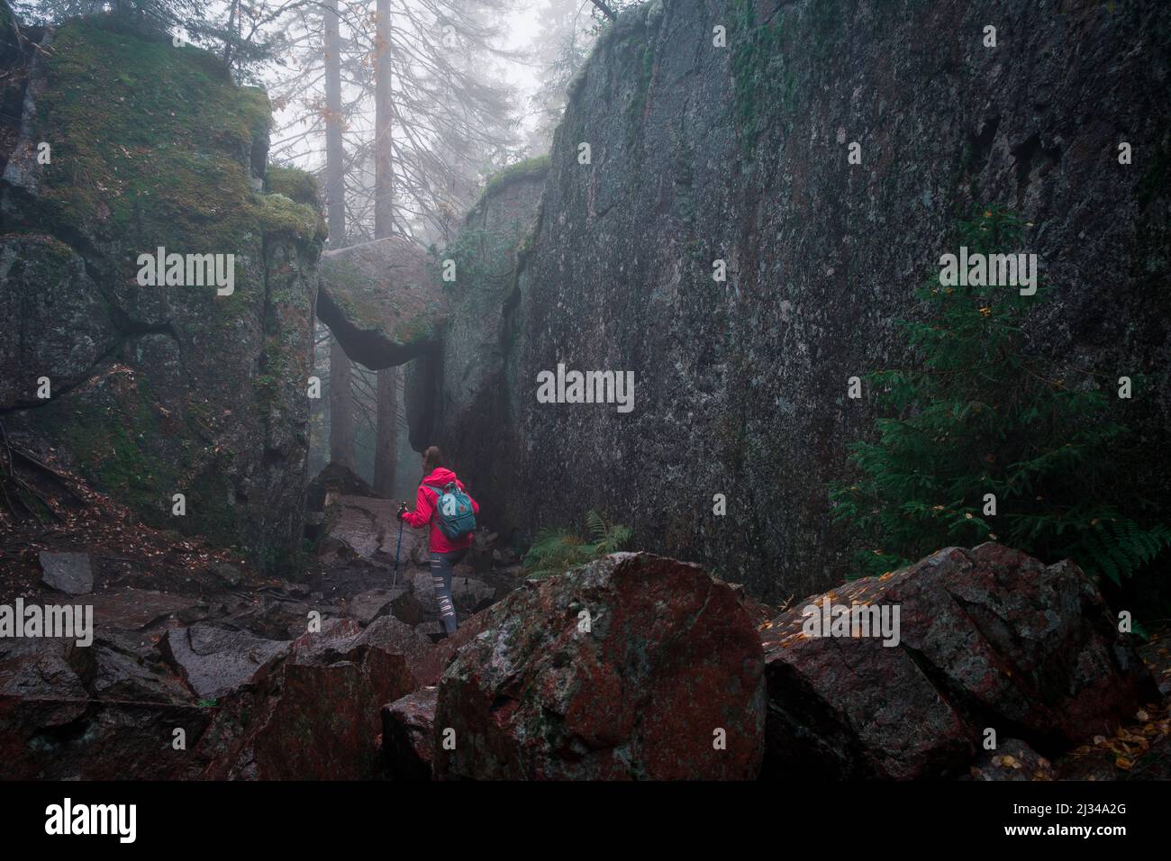 Woman in crevice hi-res stock photography and images - Alamy