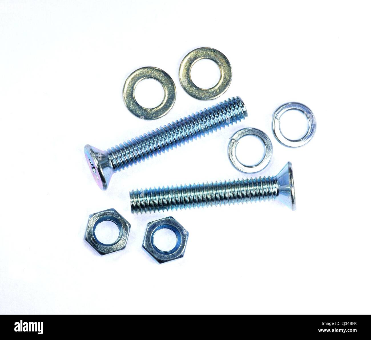A closeup shot of nut bolts on isolated white background Stock Photo ...