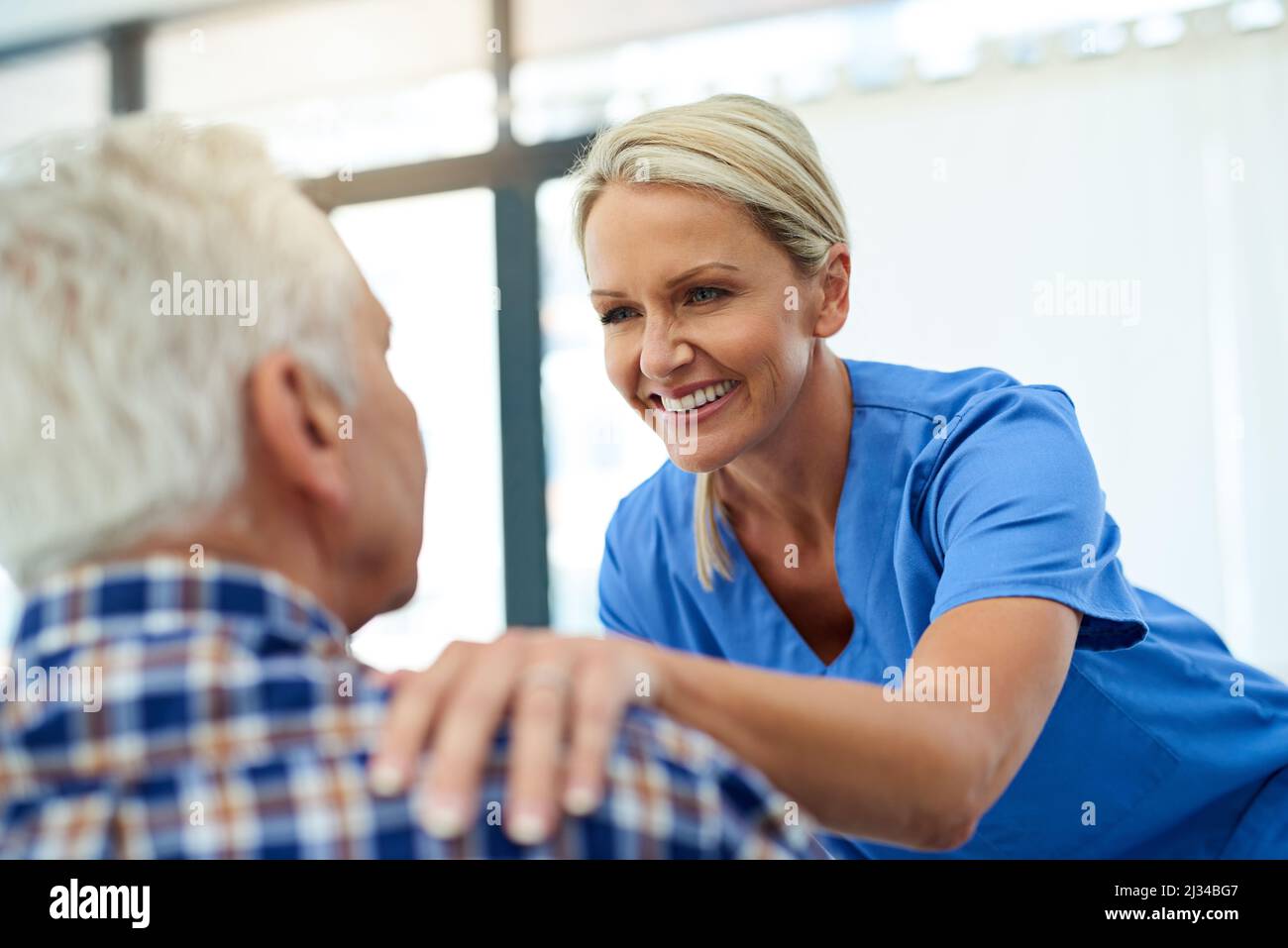 Dont worry, youll be fine. Shot of a friendly healthcare practitioner ...