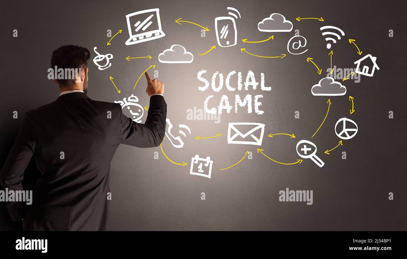 businessman drawing social media icons Stock Photo - Alamy