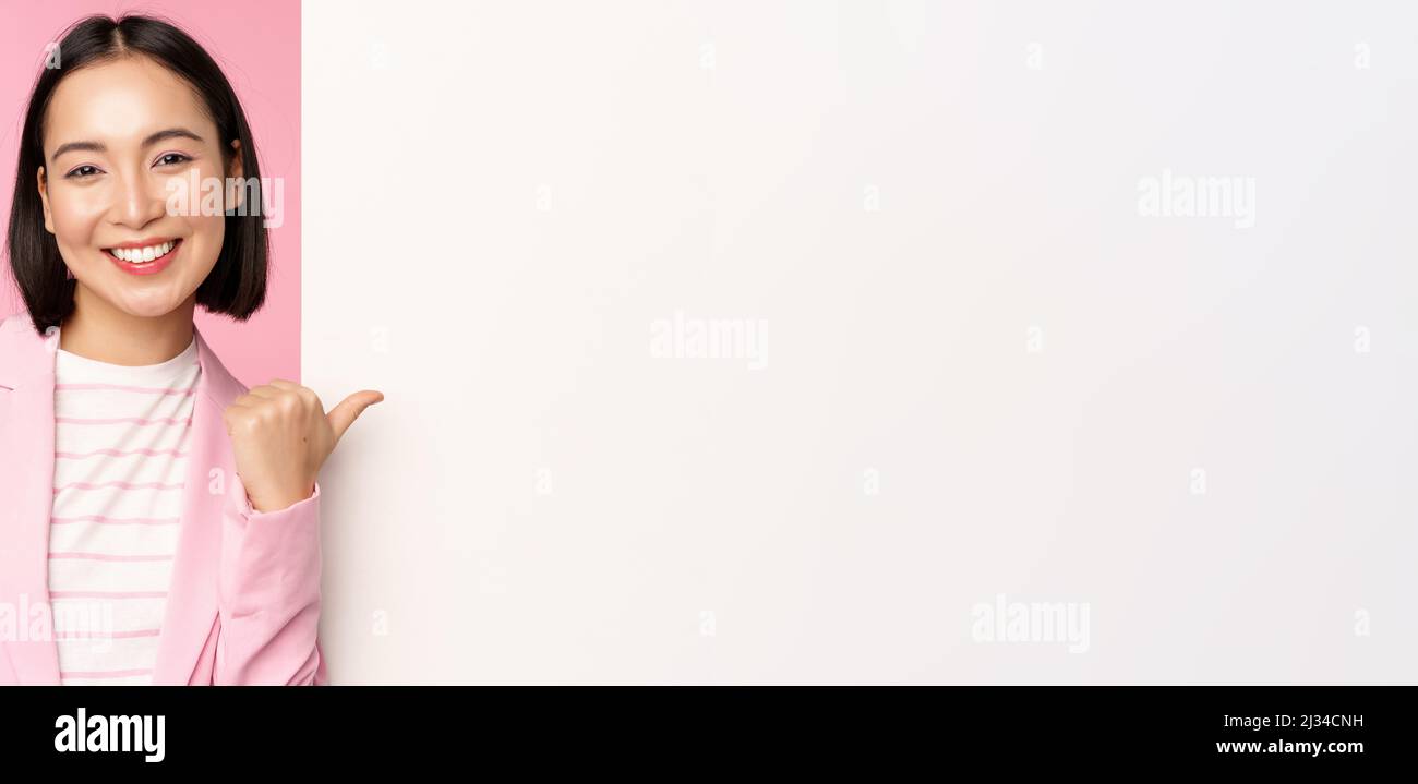 Portrait of smiling asian businesswoman in suit, corporate lady ...