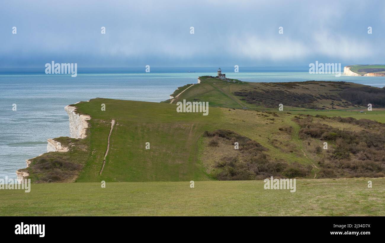 Beautiful cliffs with green hills on white cliffs next to the ocean ...
