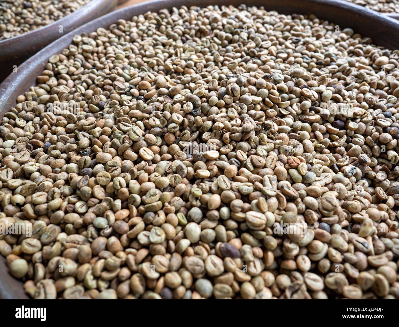 A closeup shot of a basin full of coffee beans Stock Photo - Alamy