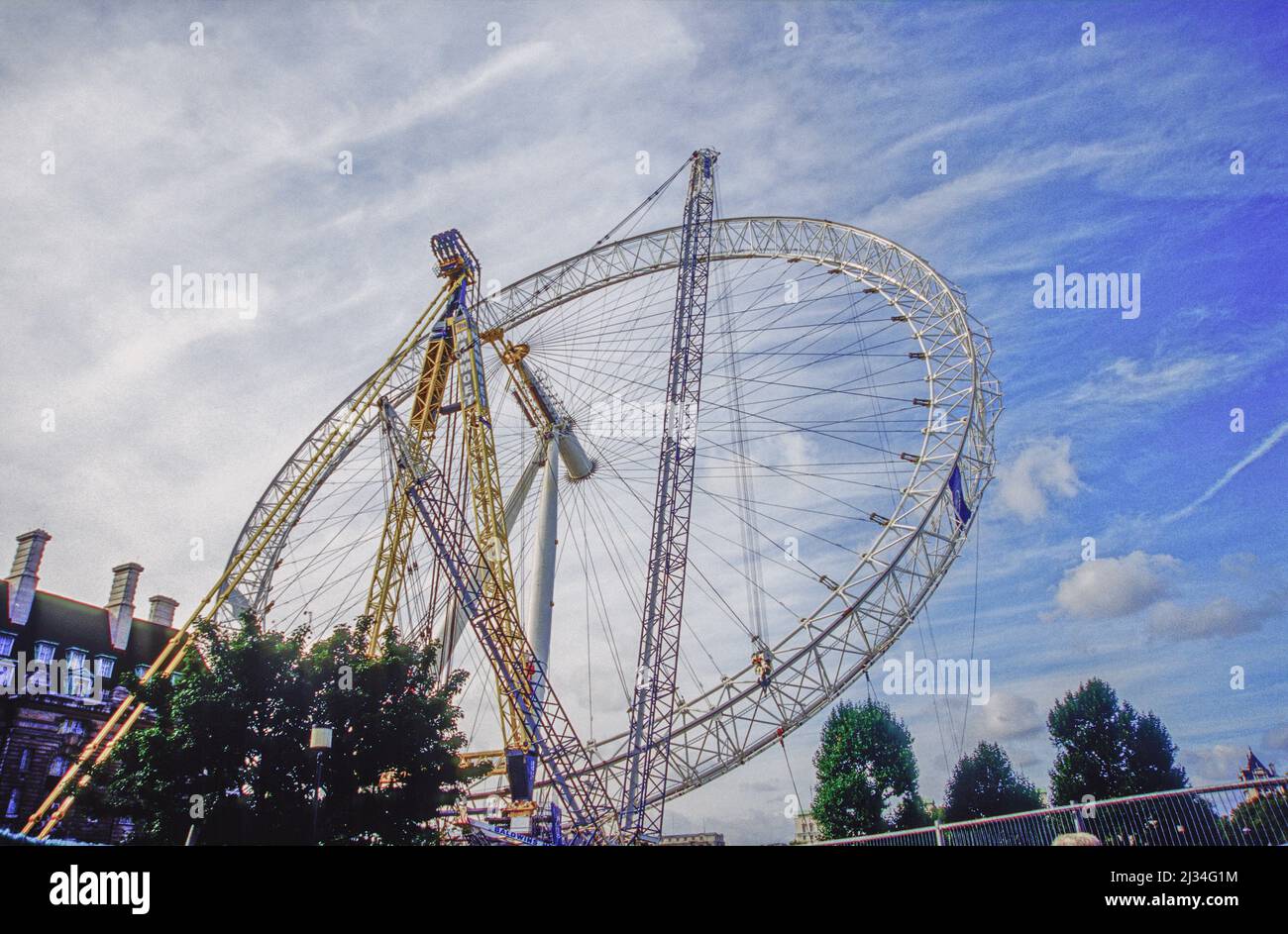 The London Eye being raised from its horizontal position during ...
