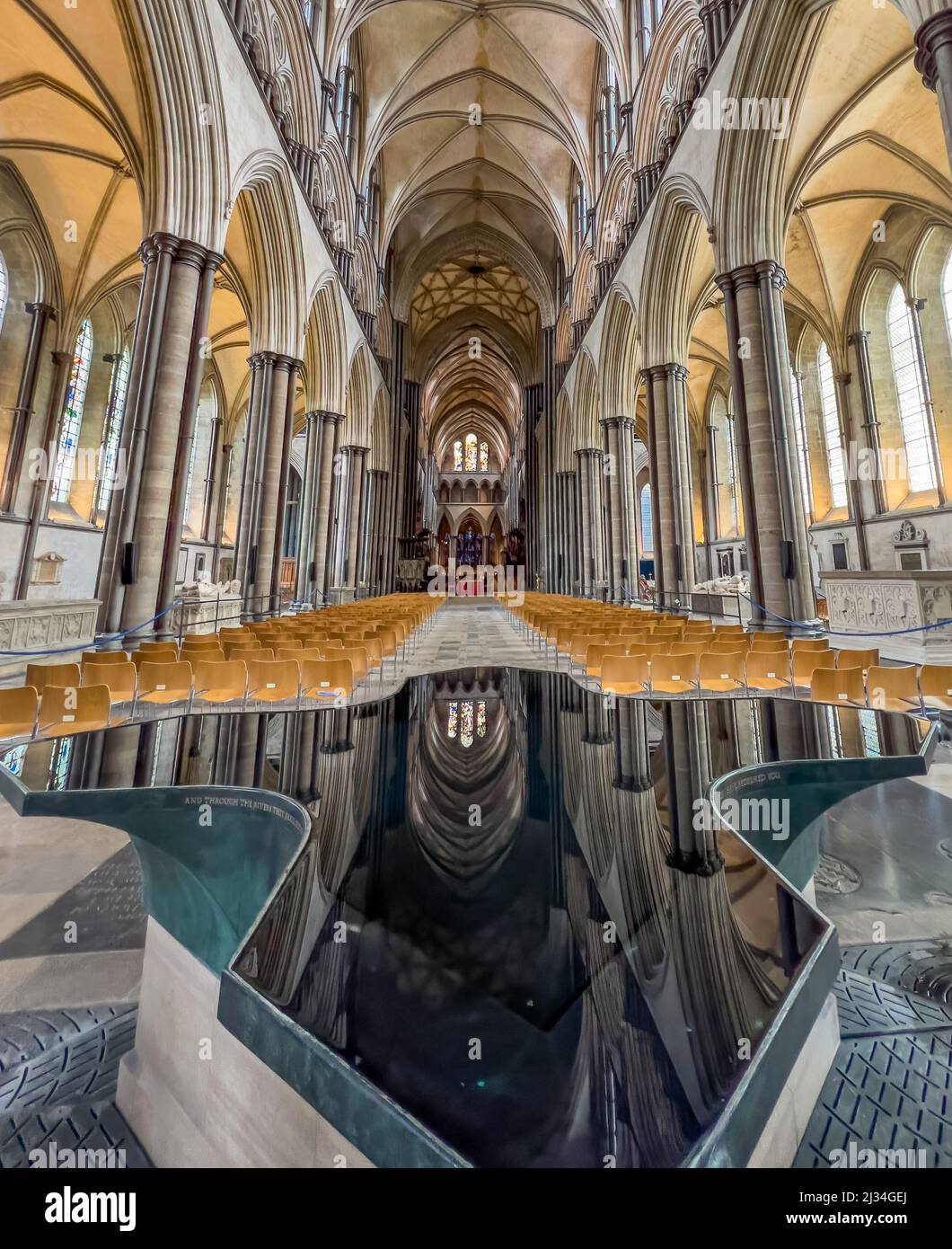 the water font with reflection of the Nave, Quire and Trinity Chapel at ...
