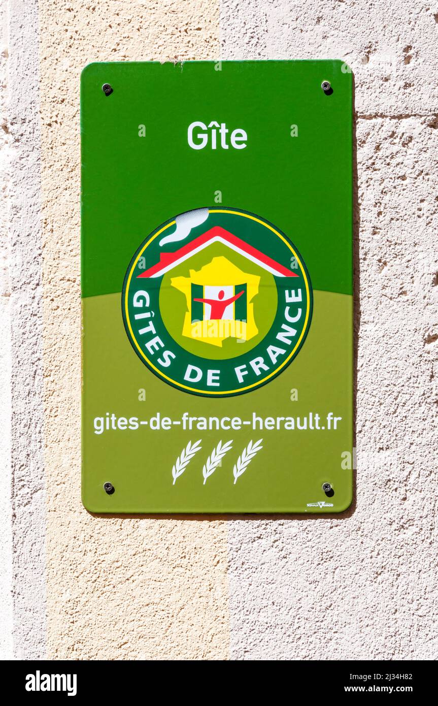 A sign for a gîte in a southern French village Stock Photo - Alamy