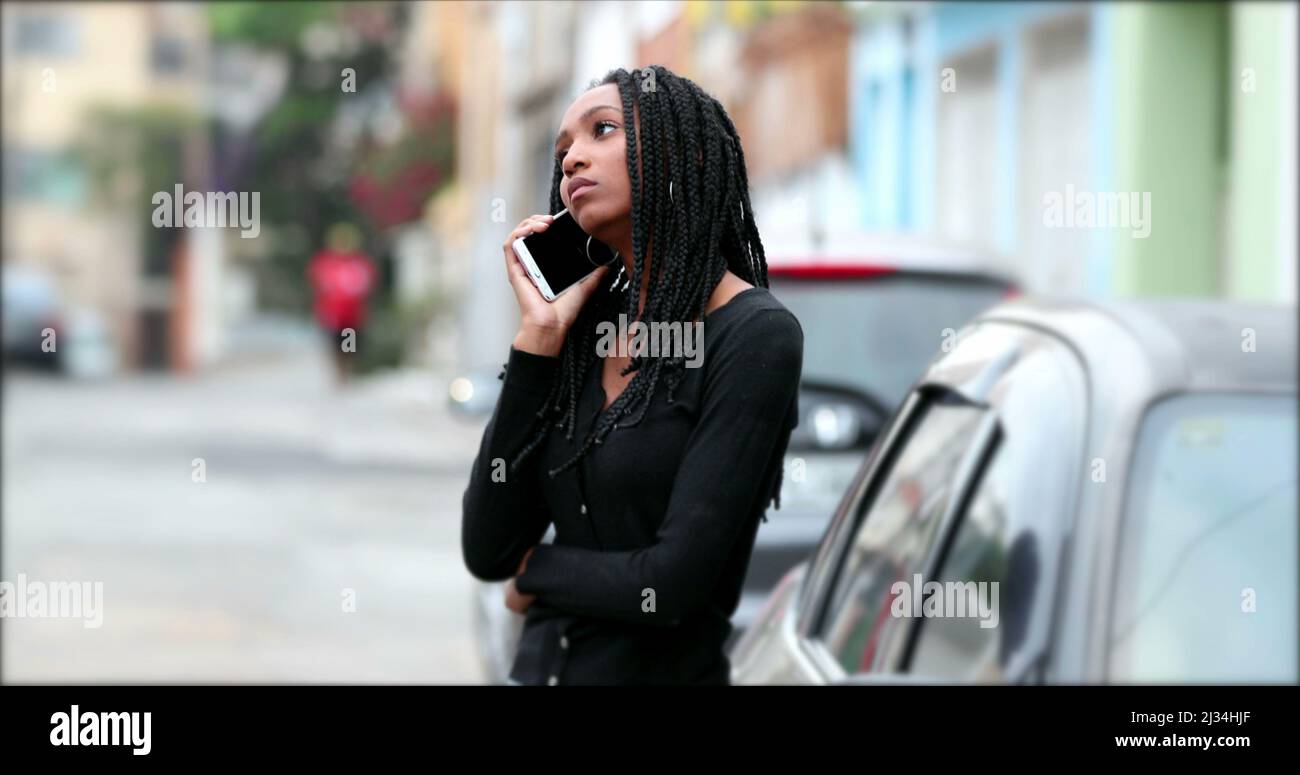 Black teen making call outside hi-res stock photography and images - Alamy