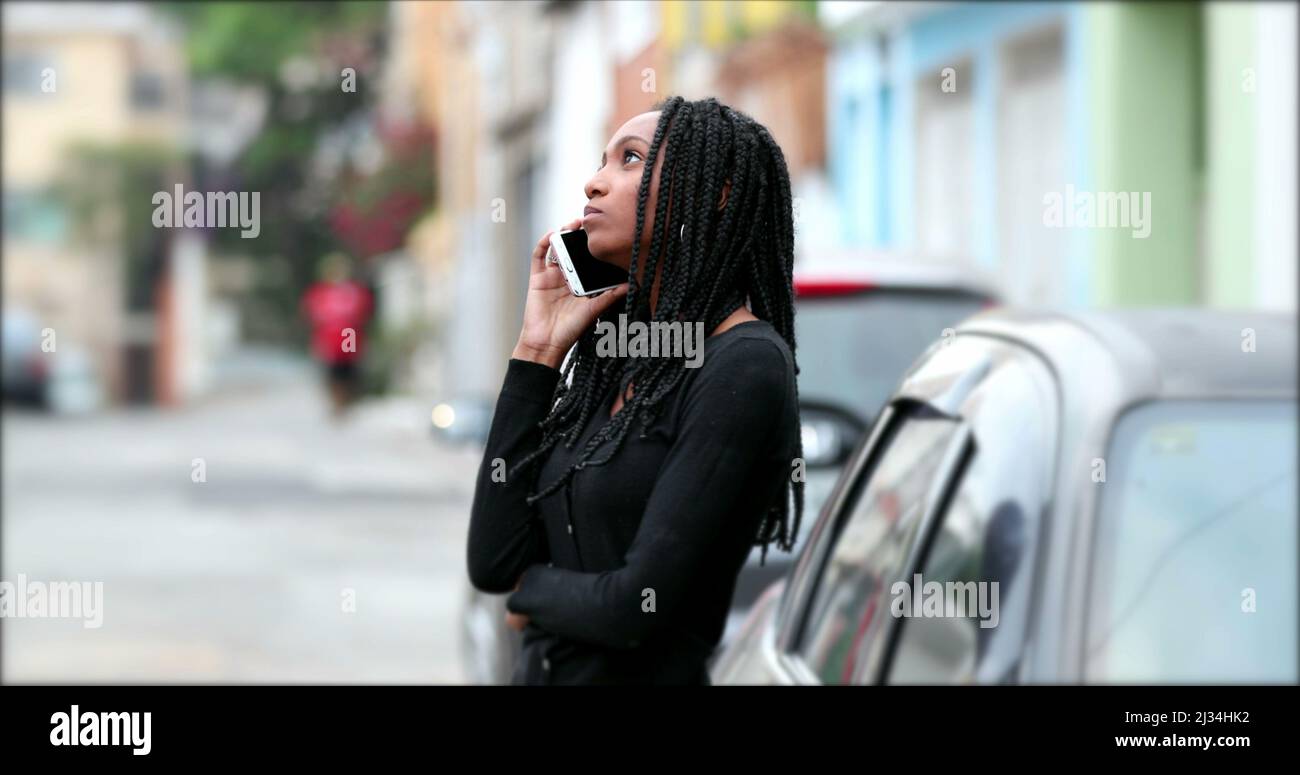 Black teen making call outside hi-res stock photography and images - Alamy