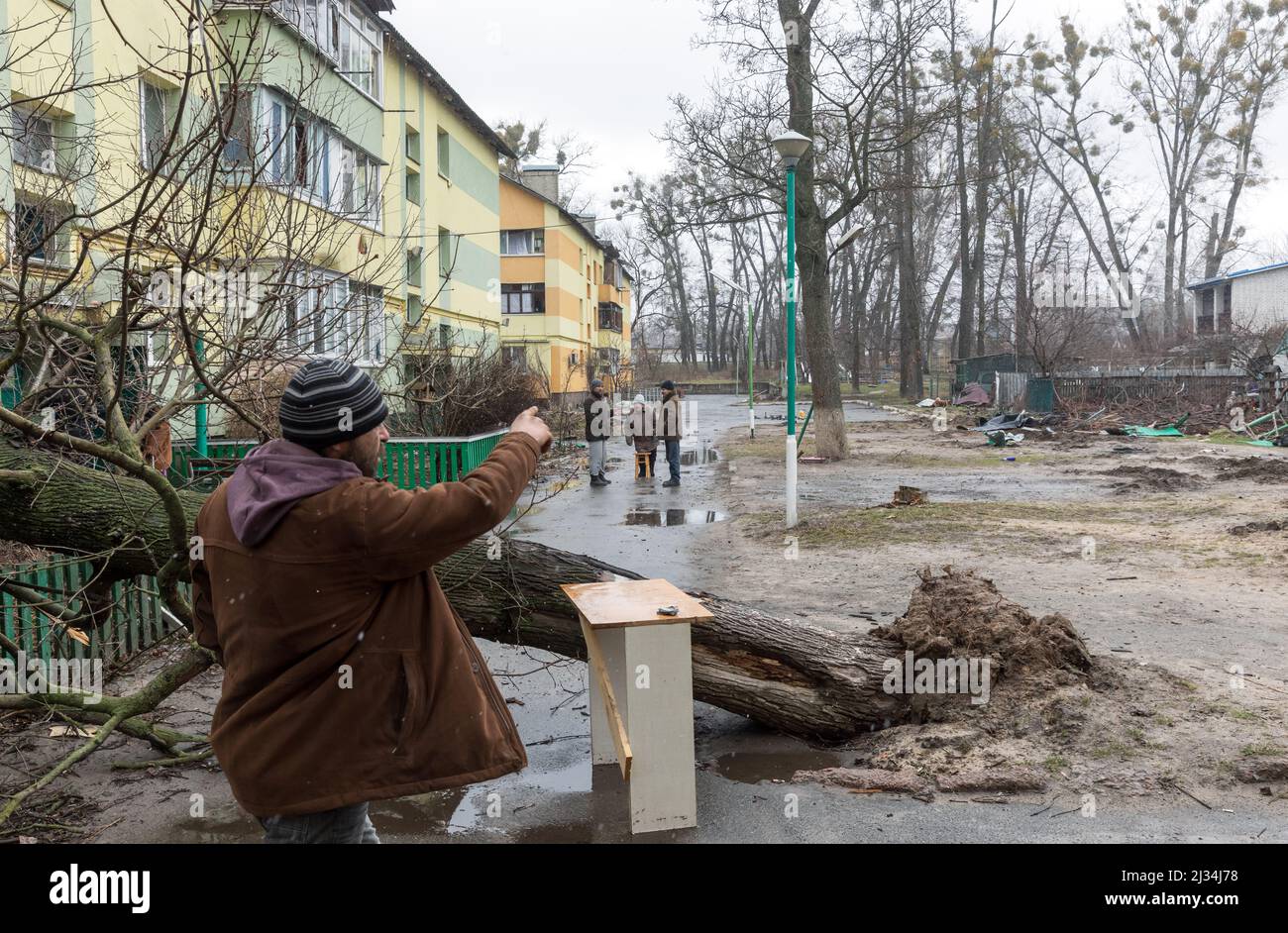 Bucha, Ukraine. 03rd Apr, 2022. A local resident tells his story of the ...