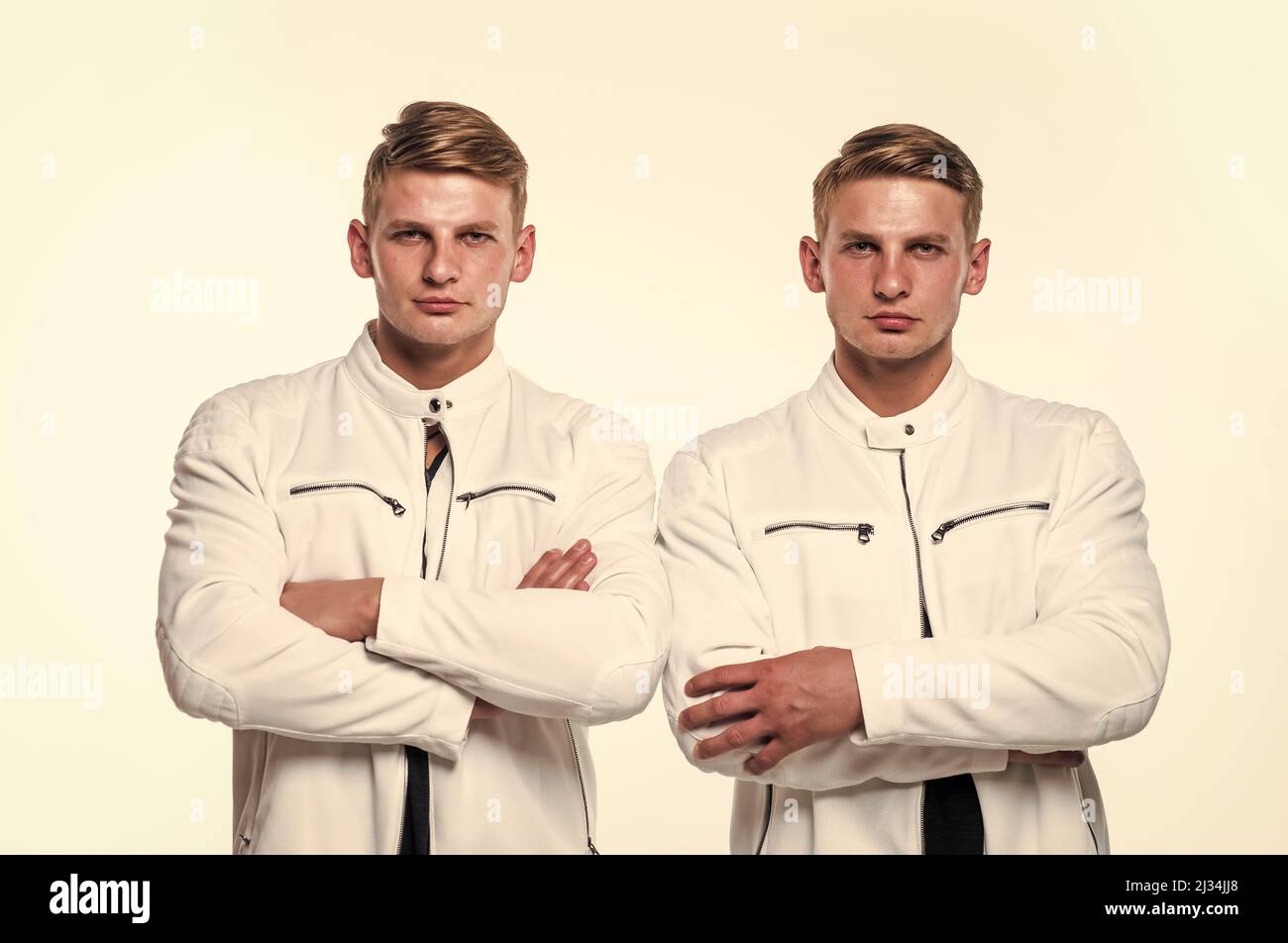 twin brothers men in white casual clothes look alike, male fashion ...