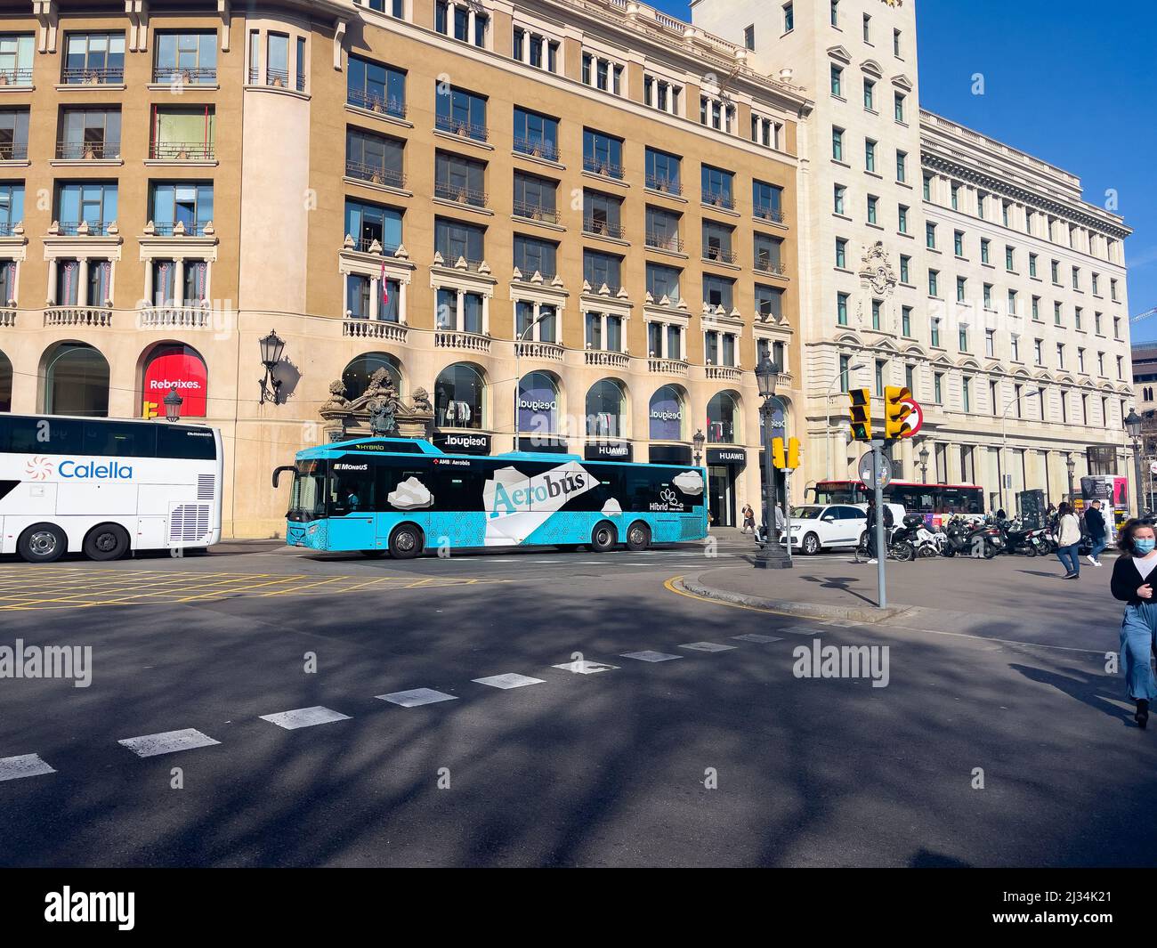 The tourist buses and cars in the streets of Barcelona, Spain Stock ...
