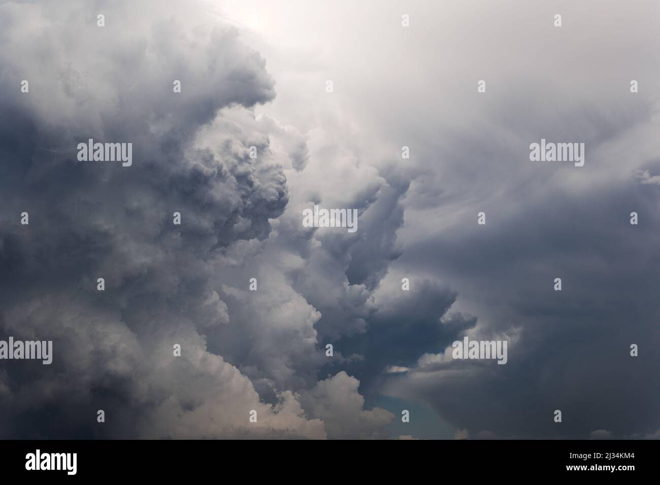 Heavy dark storm clouds before rain. Dramatic clouds become dark gray ...