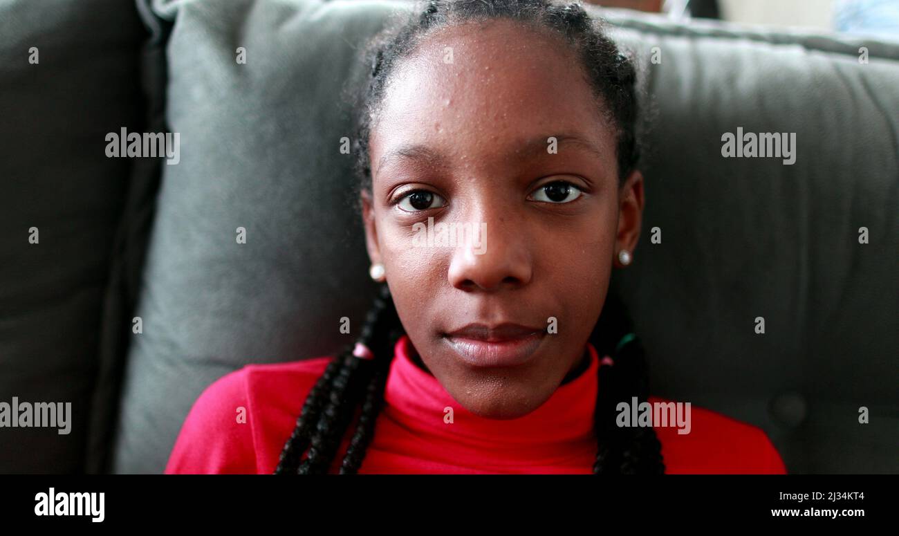Teenage black girl smiling at camera, Portrait African descent girl ...