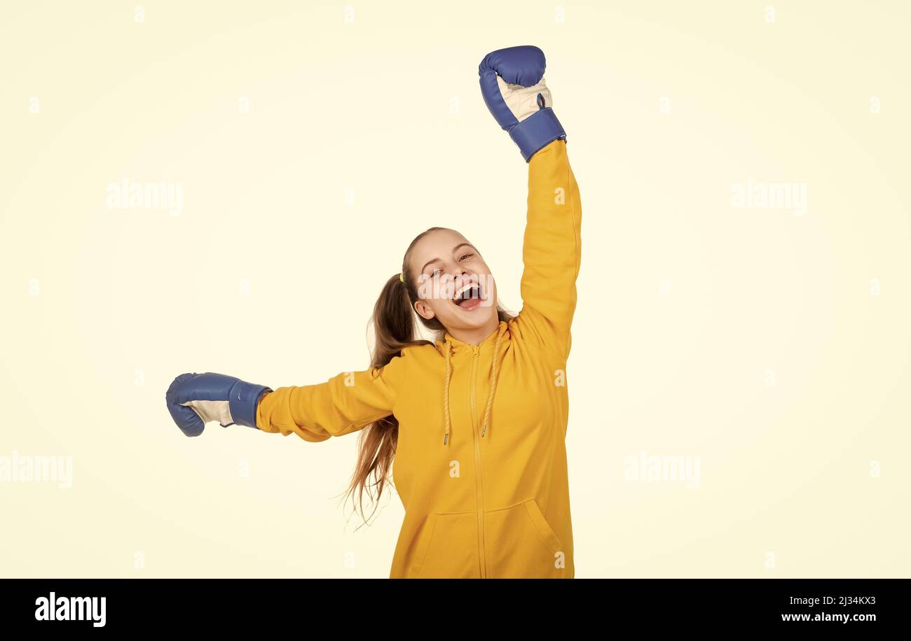happy kid celebrate victory. winner of fight. teen girl in boxing ...