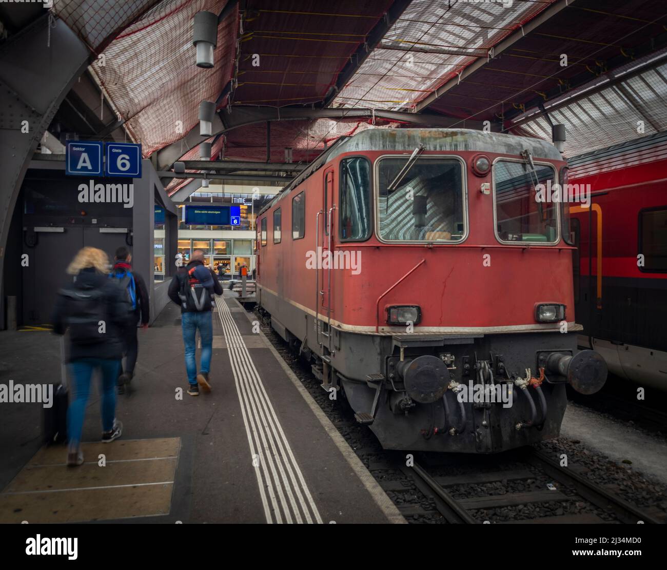 Red electric old locomotive in Zurich station in centre of Switzerland ...