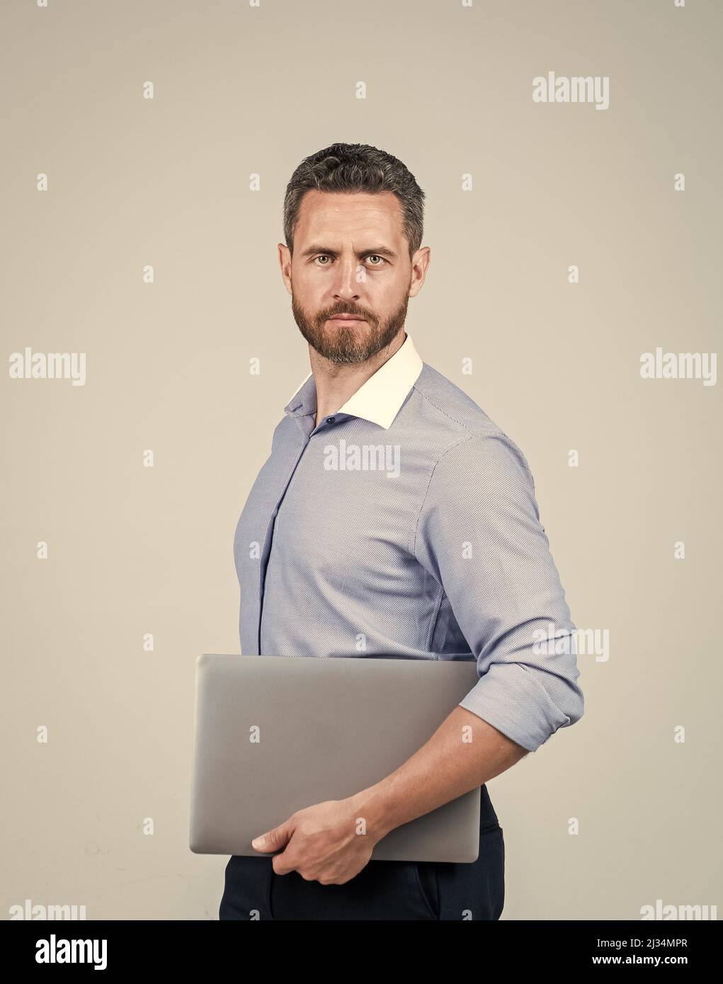 unshaven male employer in formalwear or office manager with computer ...