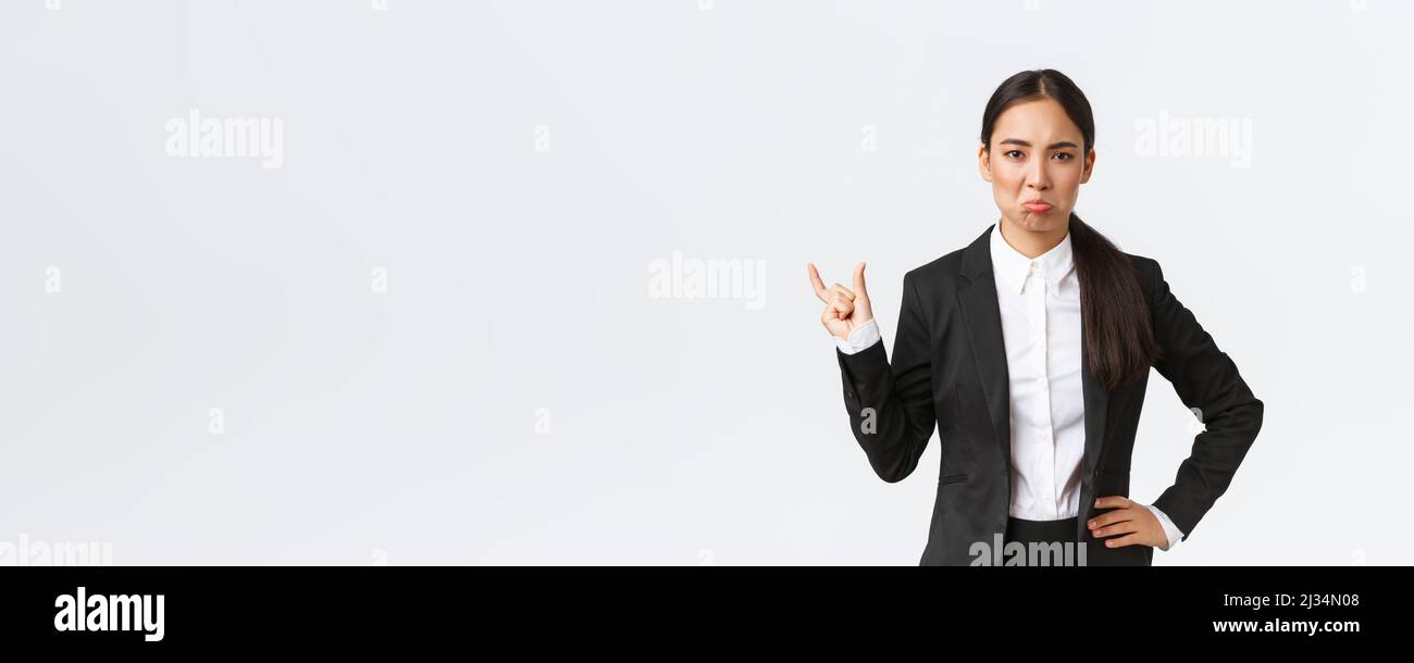 Angry disappointed saleswoman in black suit complaining on small ...