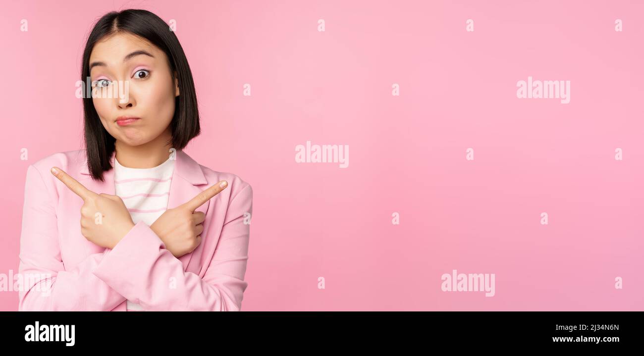 Decision concept. Young asian businesswoman, corporate worker pointing ...