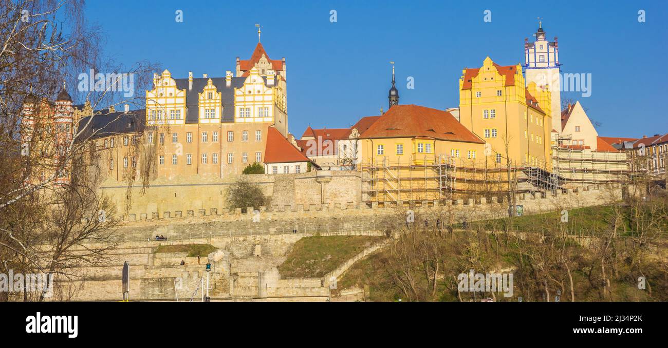 Panorama of the colorful buildings of the castle in Bernburg, Germany ...