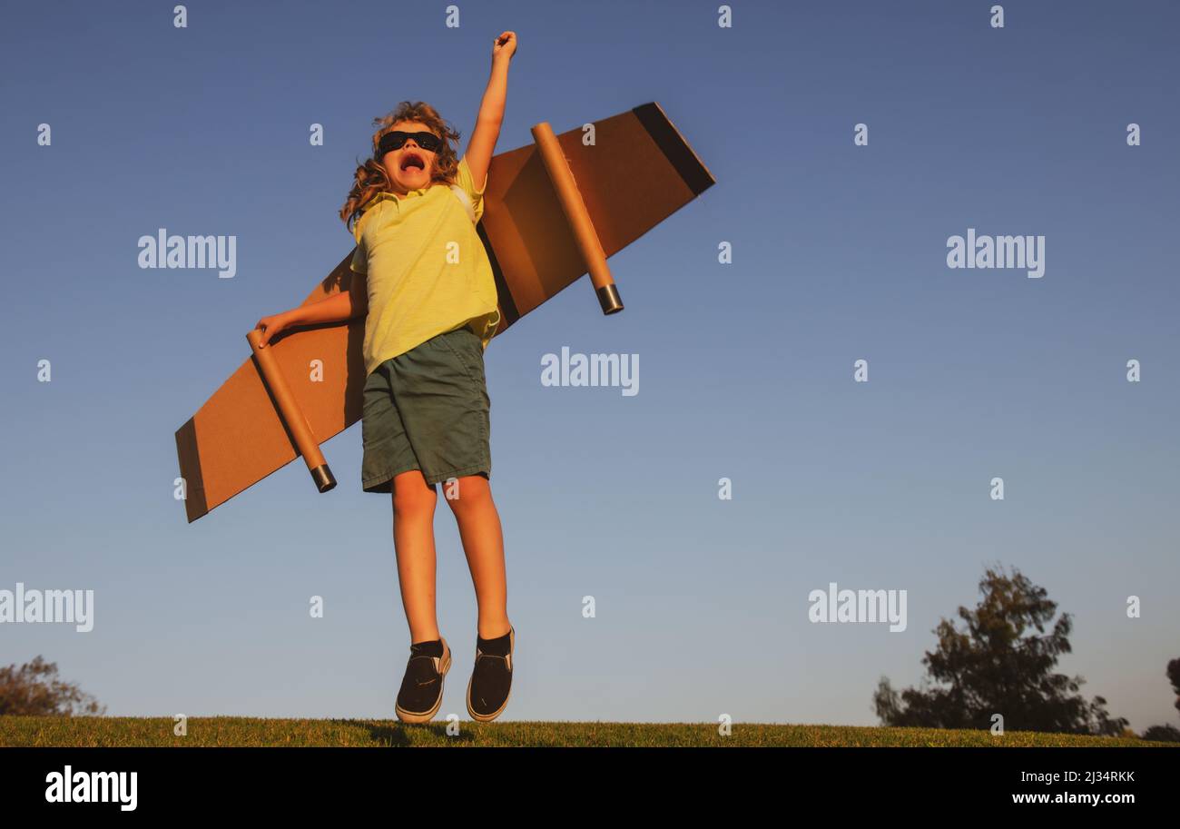 Kids leader and winner, success start up. Excited child boy play with ...