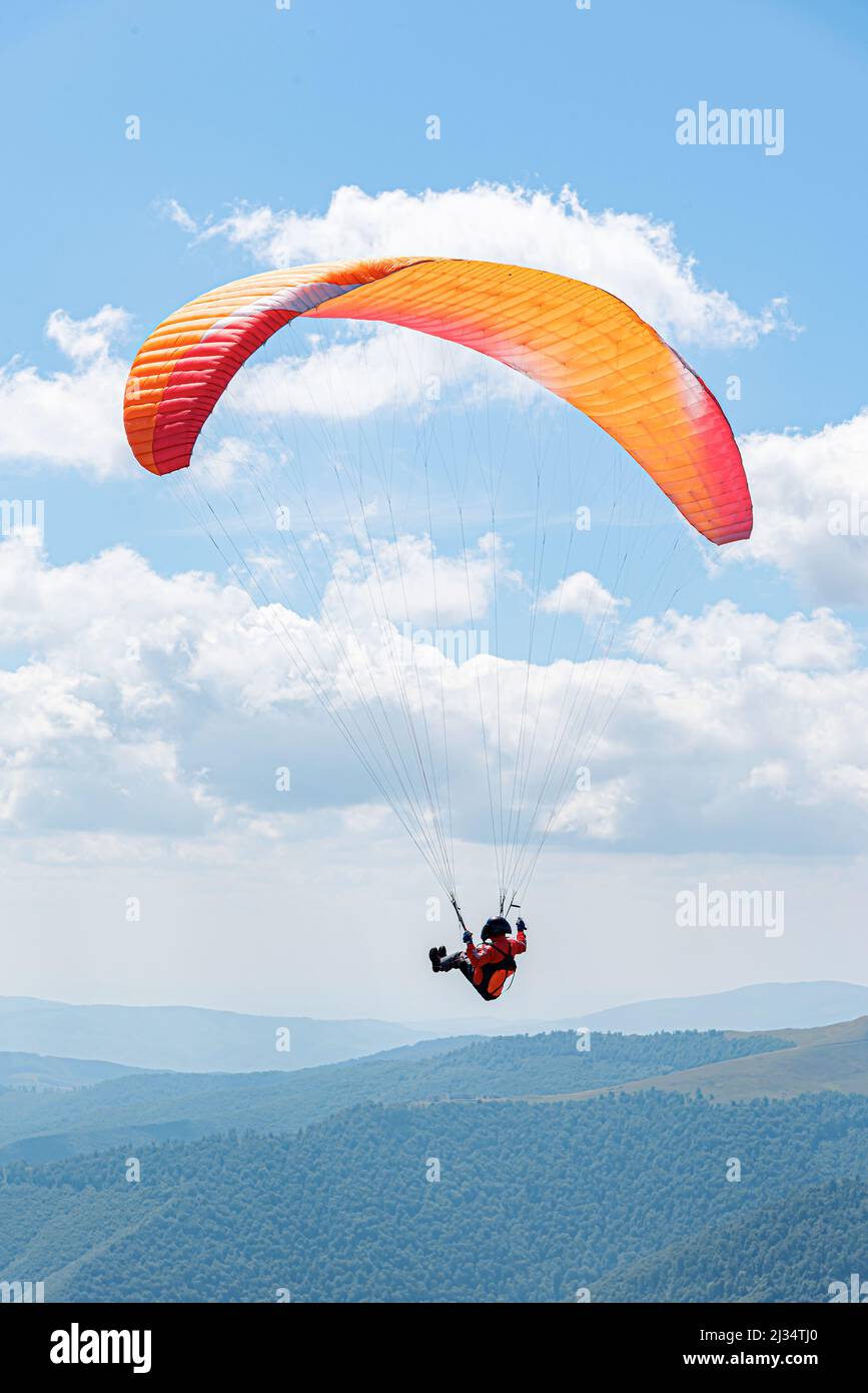 Paragliding on the background of the skys Stock Photo - Alamy