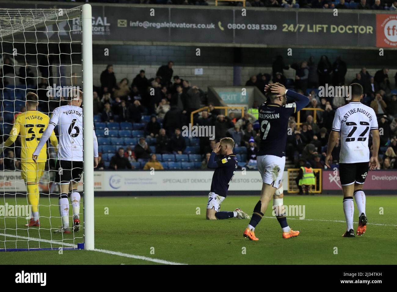George Saville #17 of Millwall has hands in his head after blazing over ...