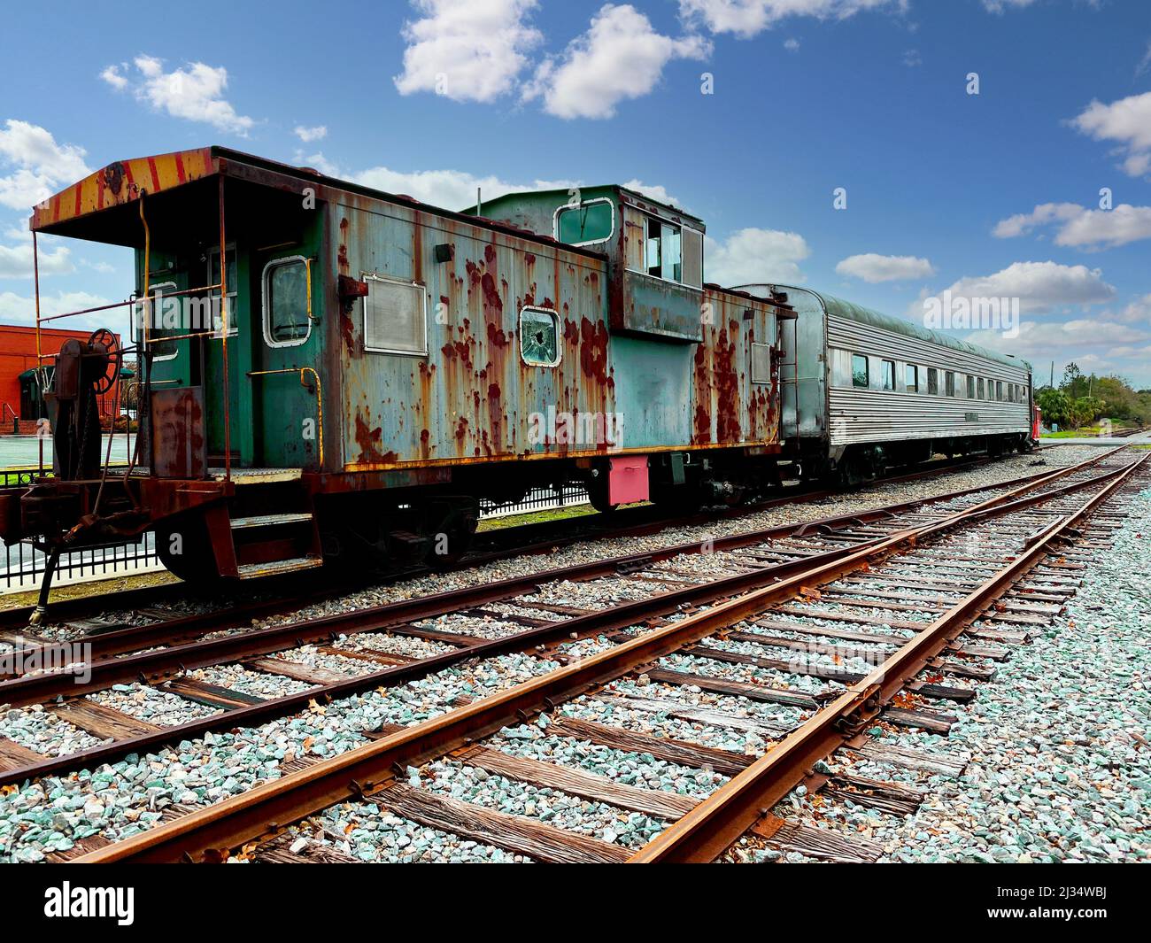 a vintage retired old train railroad card rusty caboose lounge car ...