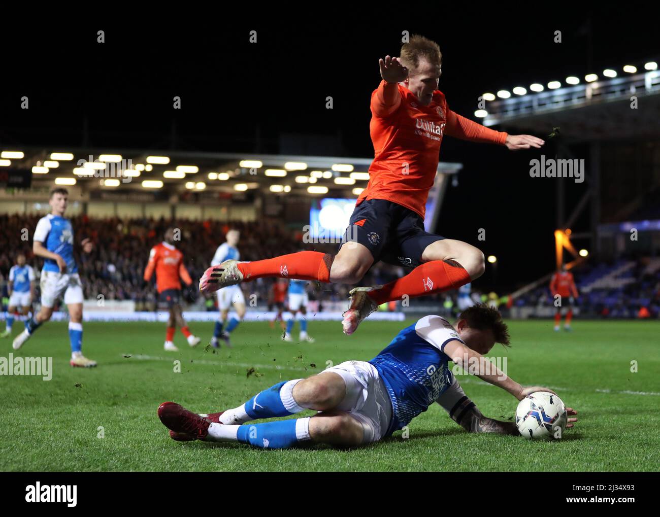 Peterborough United's Frankie Kent challenges Luton Town's James Bree ...