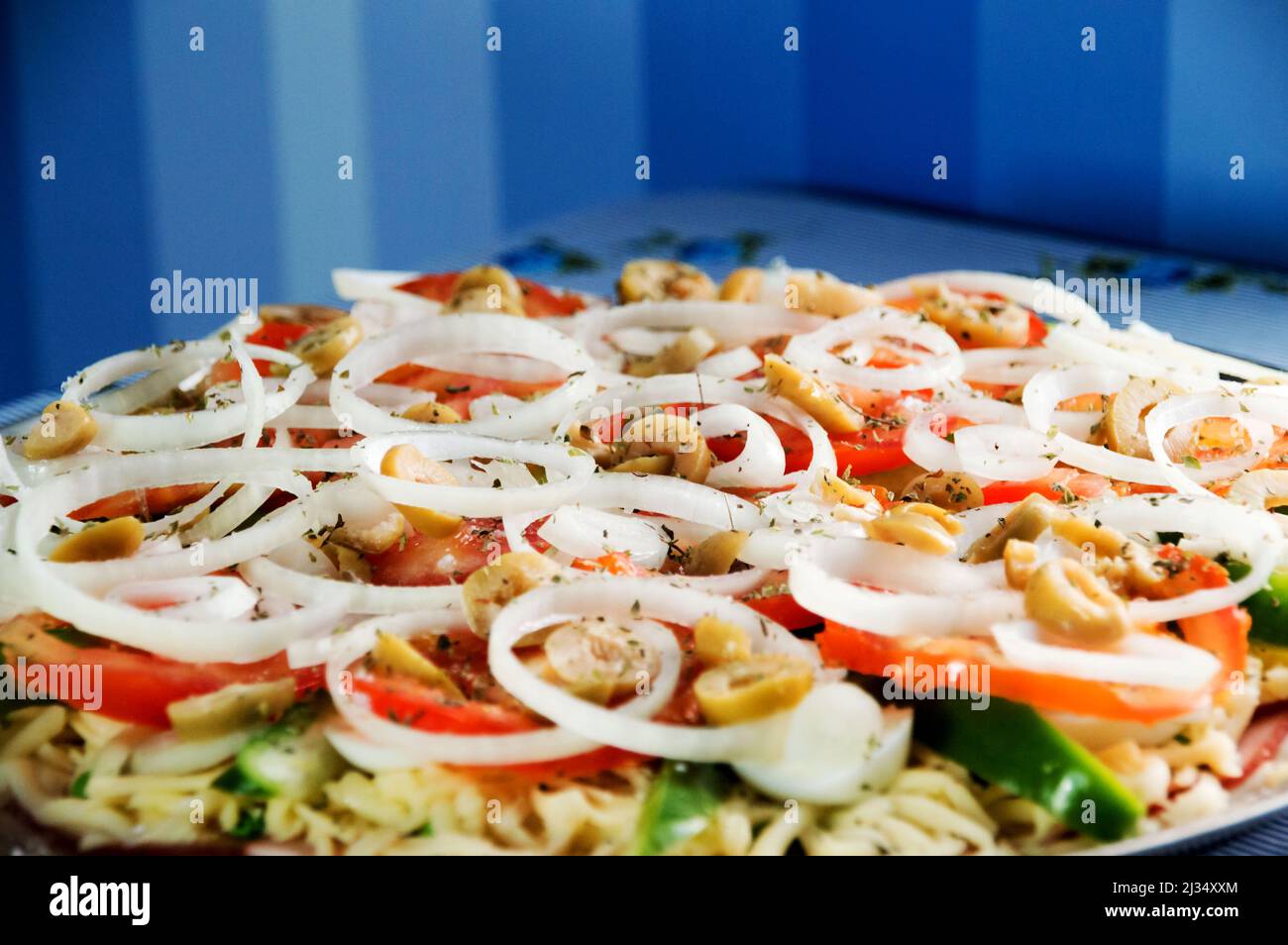 Traditional Brazilian pizza with tomato, onion, peppers, olives ...
