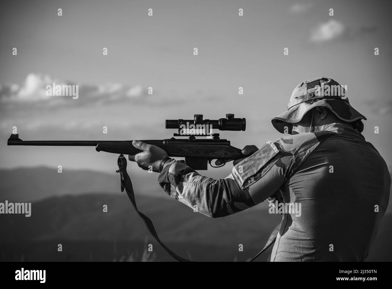 Hunter Classic. Hunter with hunting gun. Man hunter with a gun. Closed ...