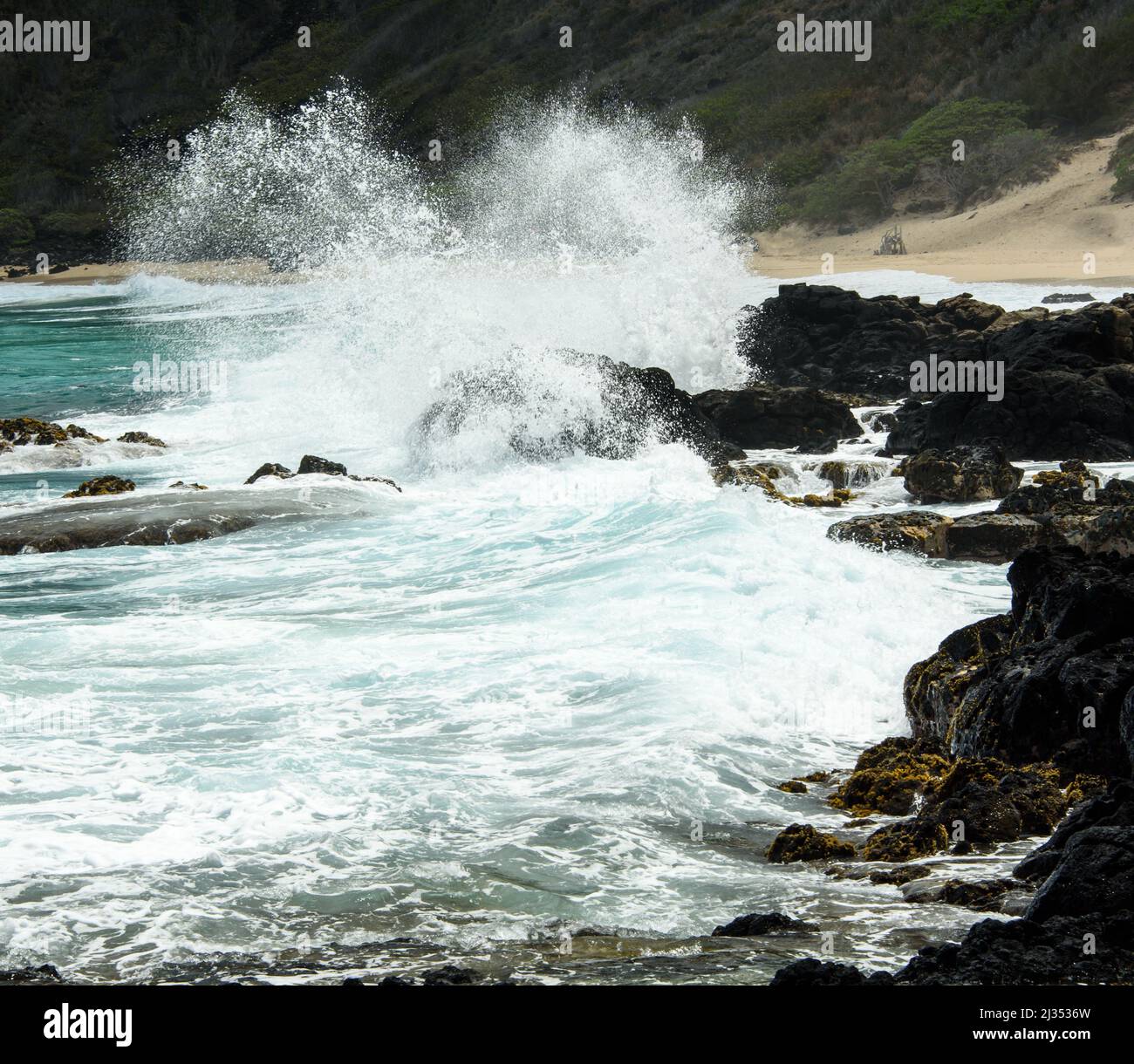 Shorebreak on a Hawaiian beach Stock Photo - Alamy