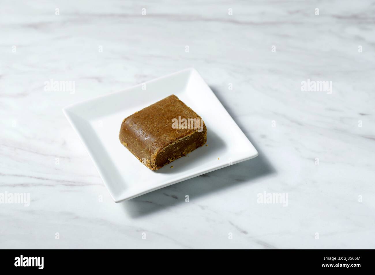 Instant Curry Japanese Paste Block on White Plate, Copy Space Stock ...