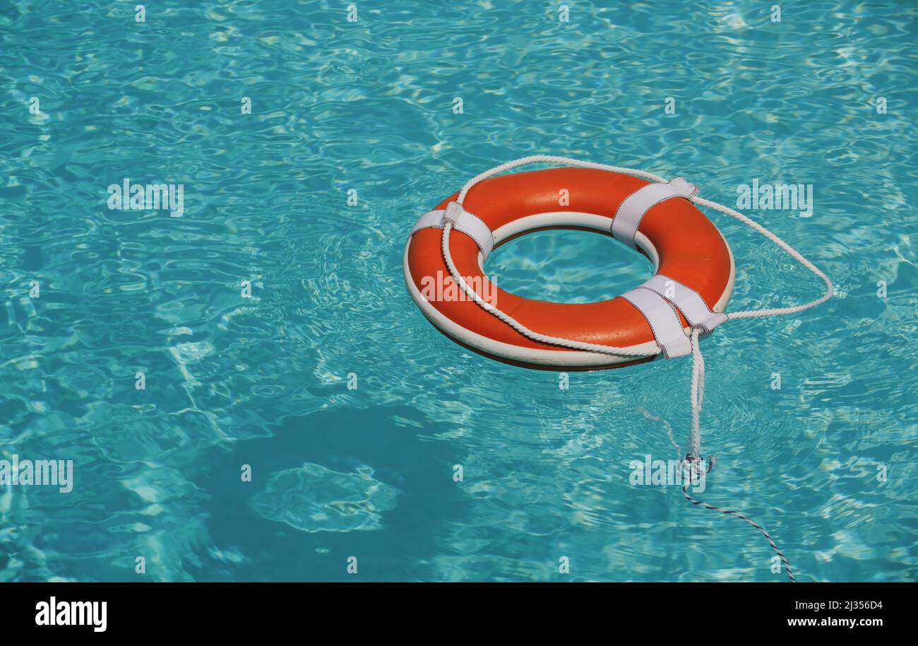 Help and drowning concept. Life saver ring floating in the water Stock ...