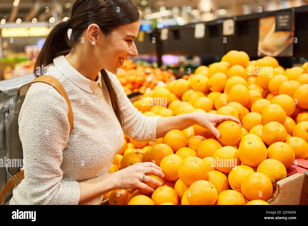Fresh orange fruit supermarket hi-res stock photography and images - Alamy