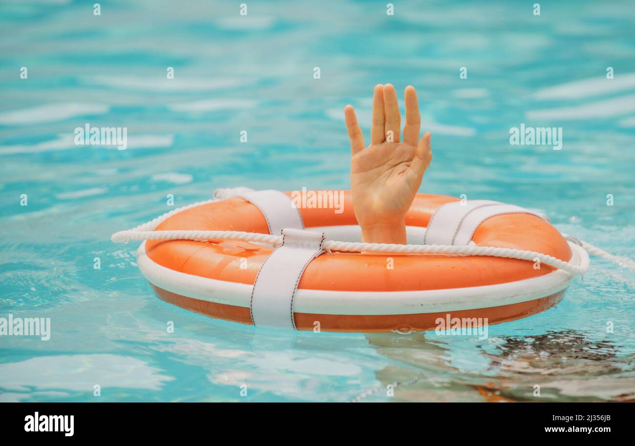 Rescue swimming ring. Drowning person. No swimming. Water rescue ...