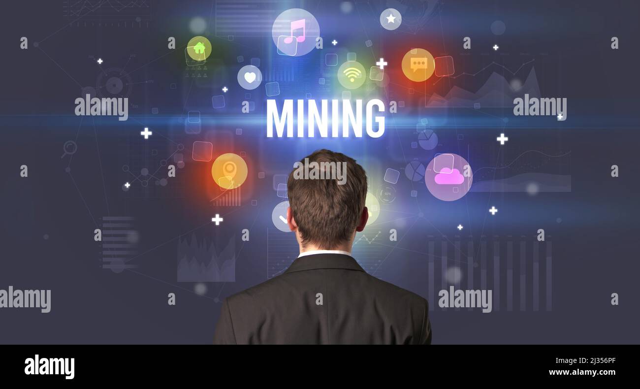 Rear view of a businessman Stock Photo - Alamy