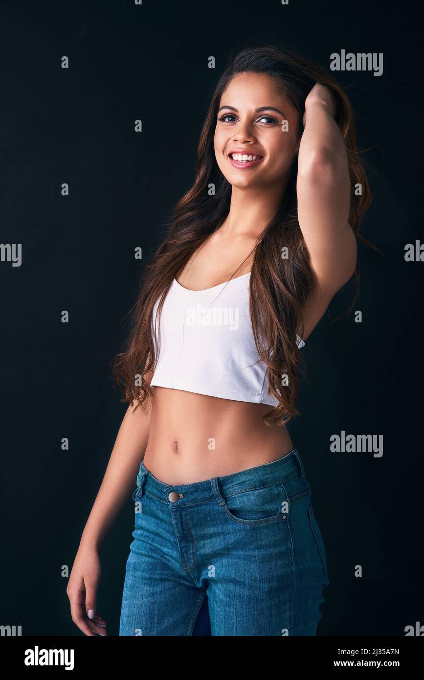 Cant help but feel utterly gorgeous. Studio portrait of an attractive ...