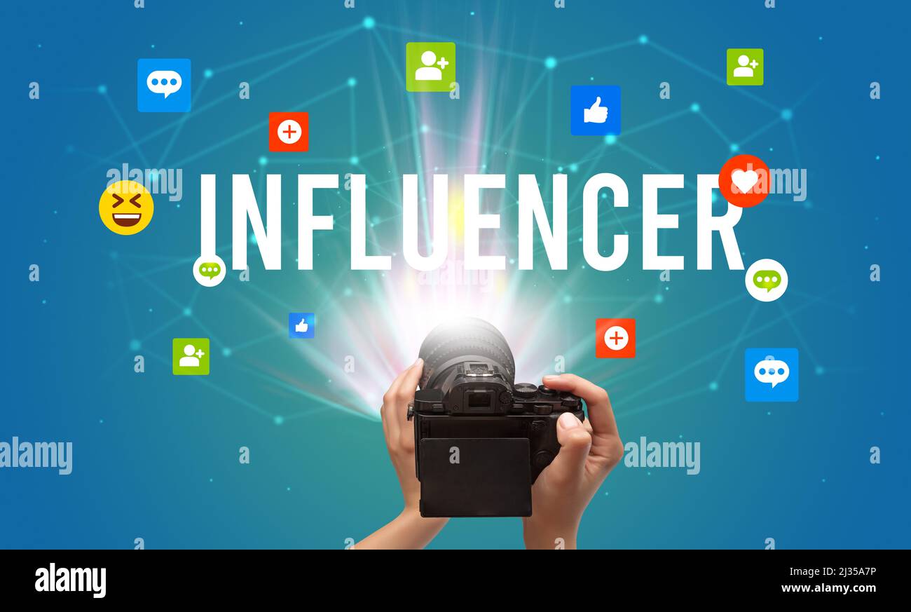 Using camera to capture social media content Stock Photo - Alamy