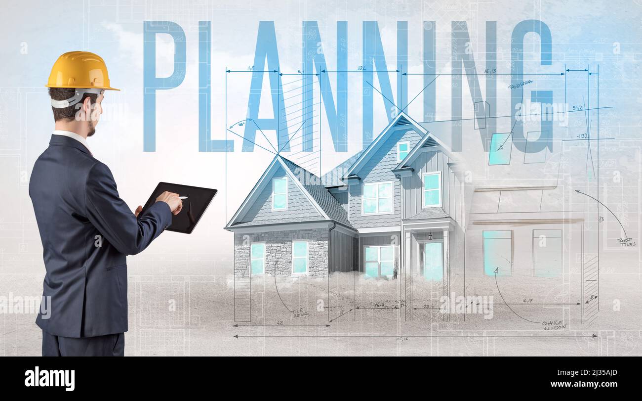 Young engineer holding blueprint concept Stock Photo - Alamy