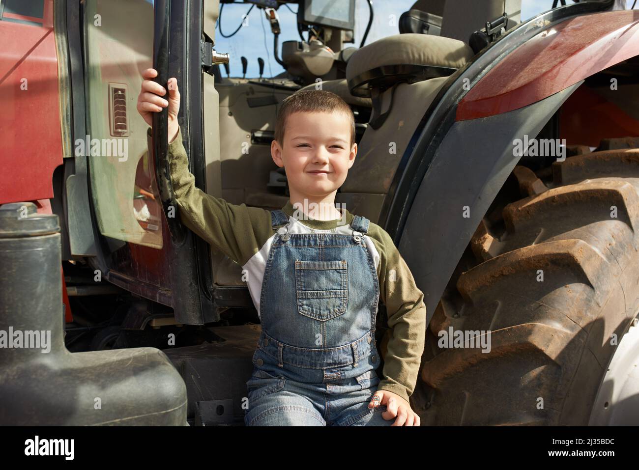 Boy working in farm field hi-res stock photography and images - Alamy