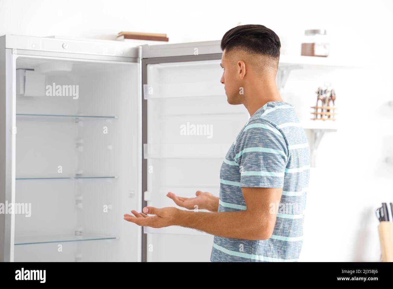 Man near open empty hi-res stock photography and images - Alamy