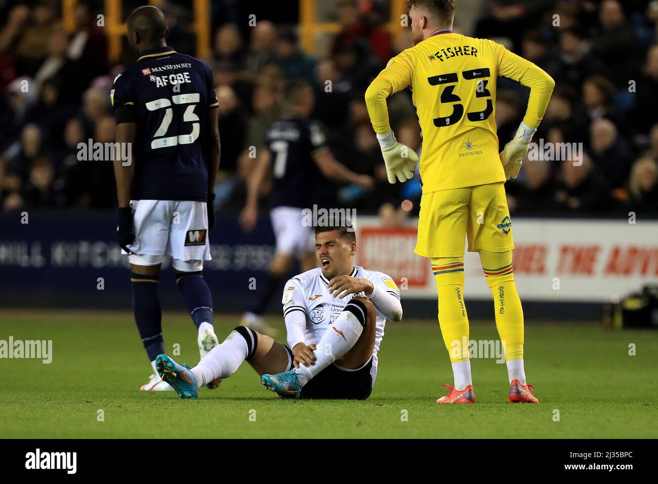 Wincing in pain football hi-res stock photography and images - Alamy