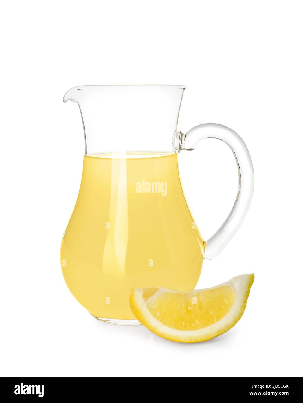 Jug of fresh lemon juice isolated on white background Stock Photo - Alamy