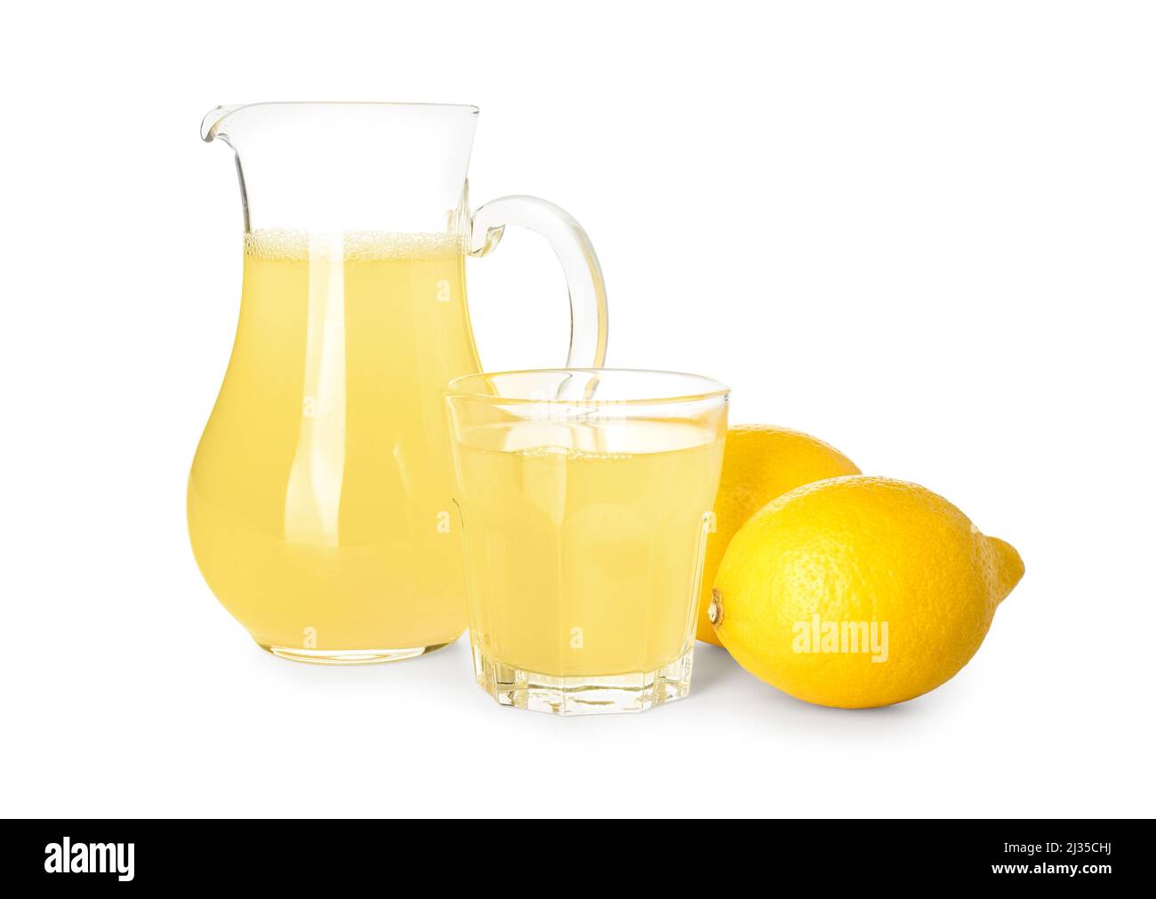 Jug and glass with fresh lemon juice on white background Stock Photo ...
